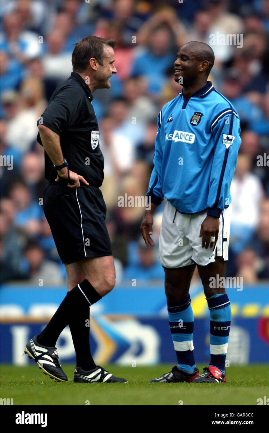 L r referee graham barber joke with manchester citys david sommeil hi ...