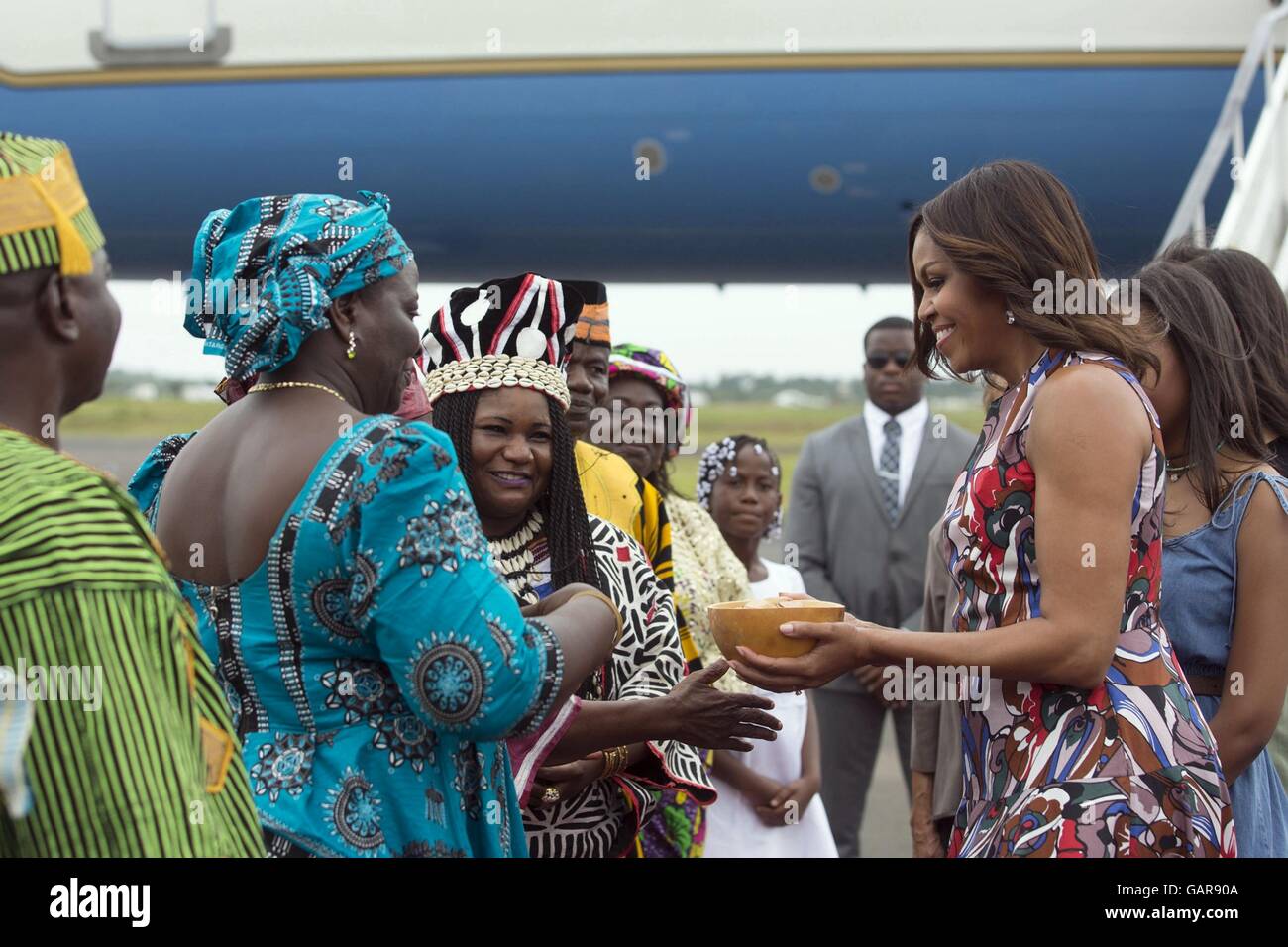 U.S First Lady Michelle Obama is welcomed by women in traditional ...