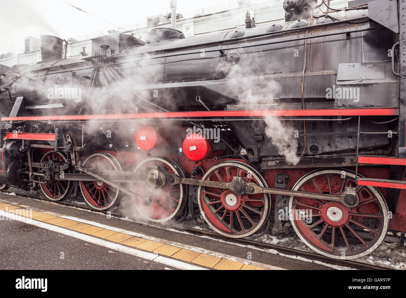 Retro steam locomotive stands by the platform Stock Photo - Alamy
