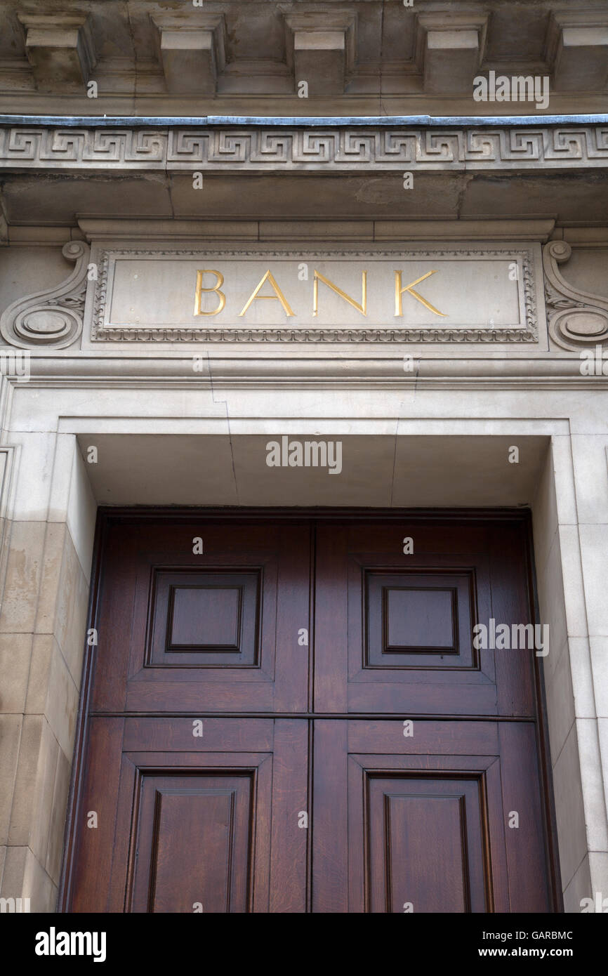 Bank Sign on Stone Facade Stock Photo - Alamy
