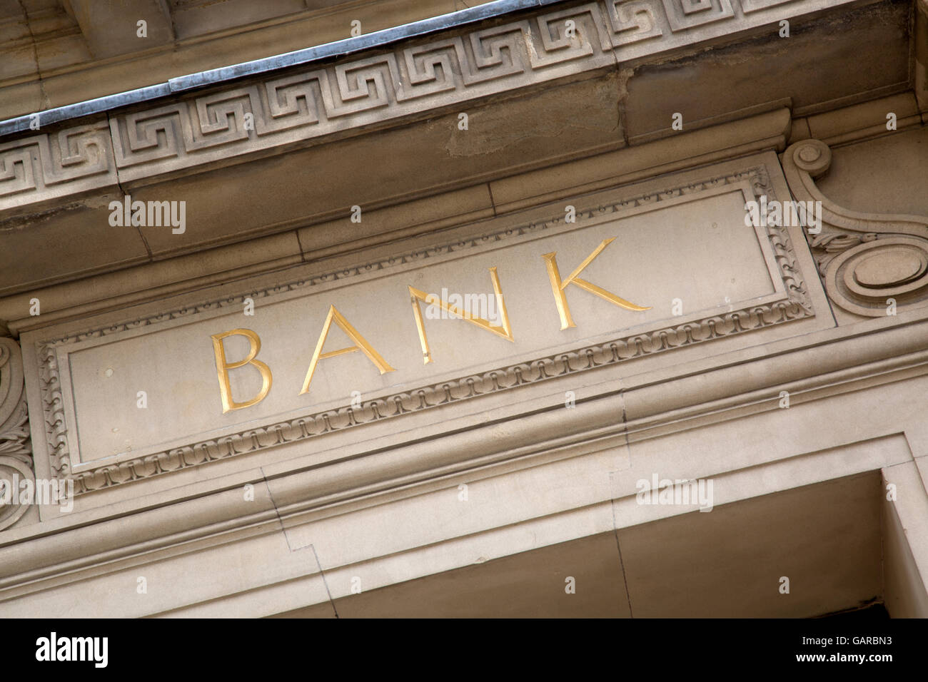 Bank Sign on Stone Facade Stock Photo - Alamy
