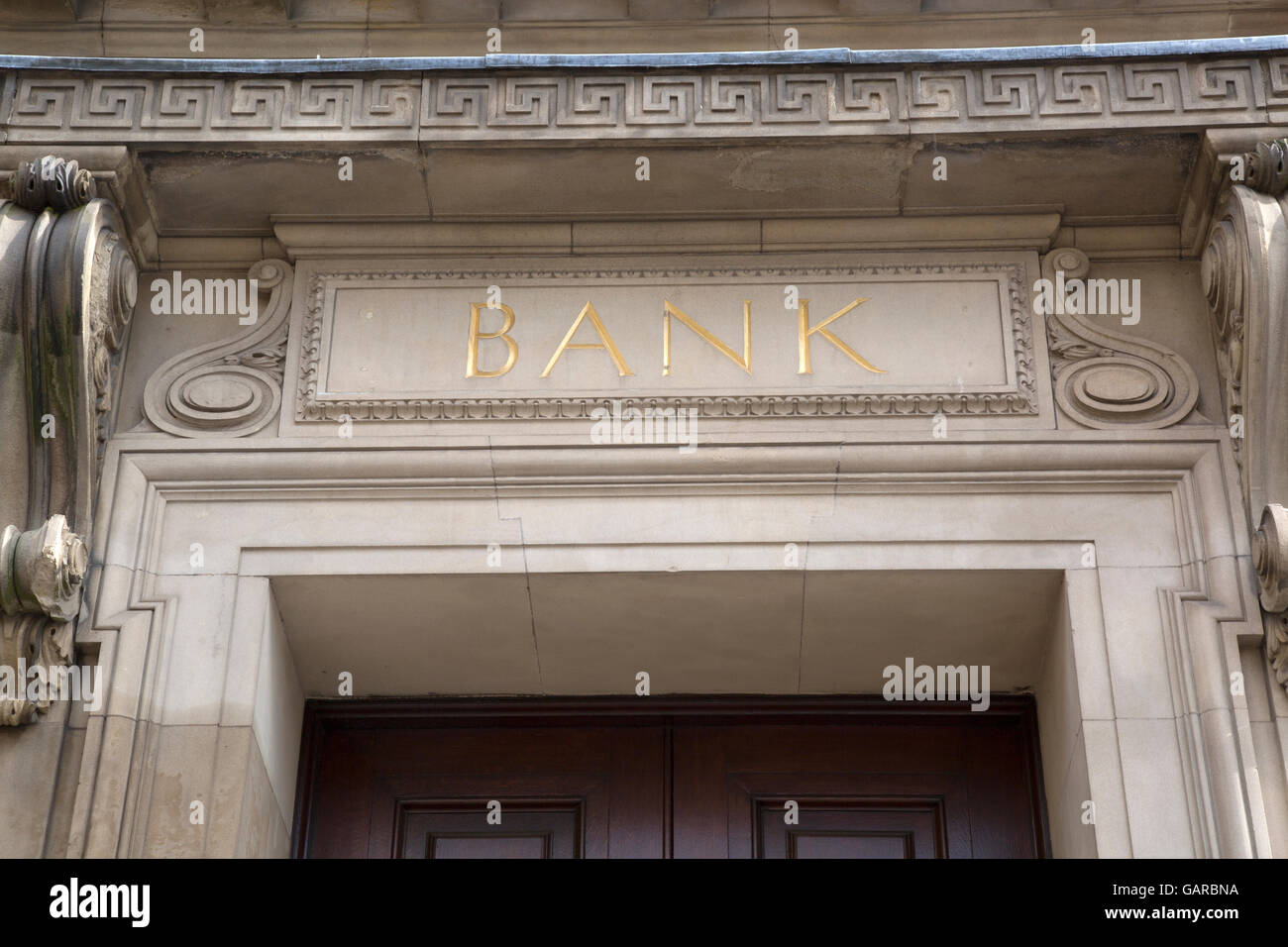 Bank Sign on Stone Facade Stock Photo - Alamy