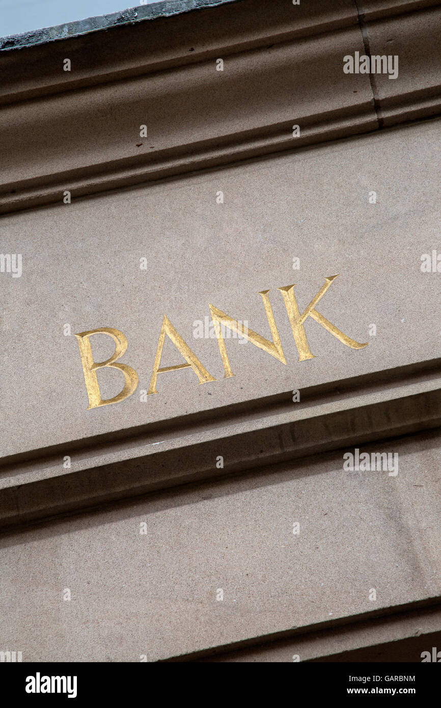 Bank Sign on Stone Facade Stock Photo - Alamy