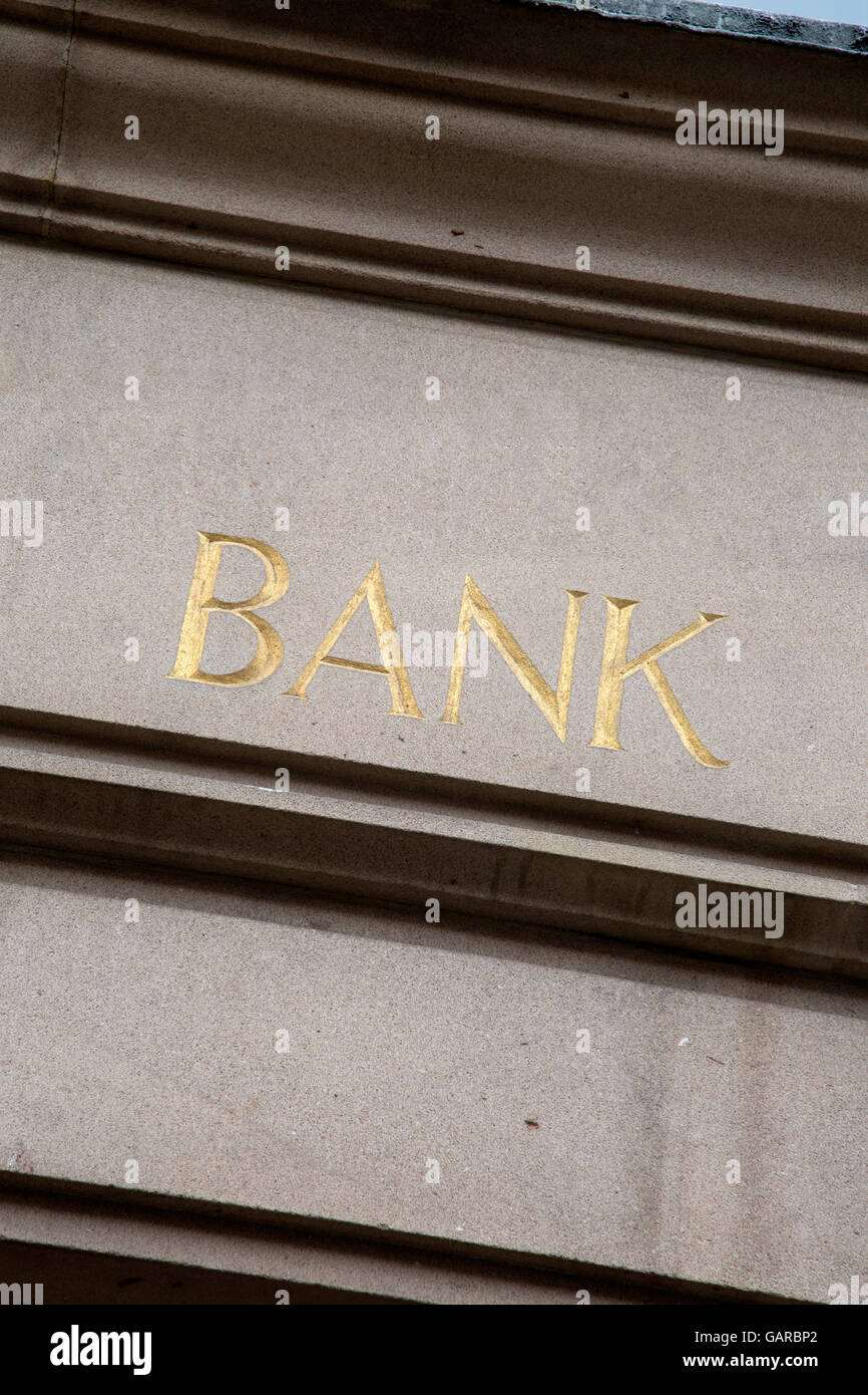 Bank Sign on Stone Facade Stock Photo - Alamy