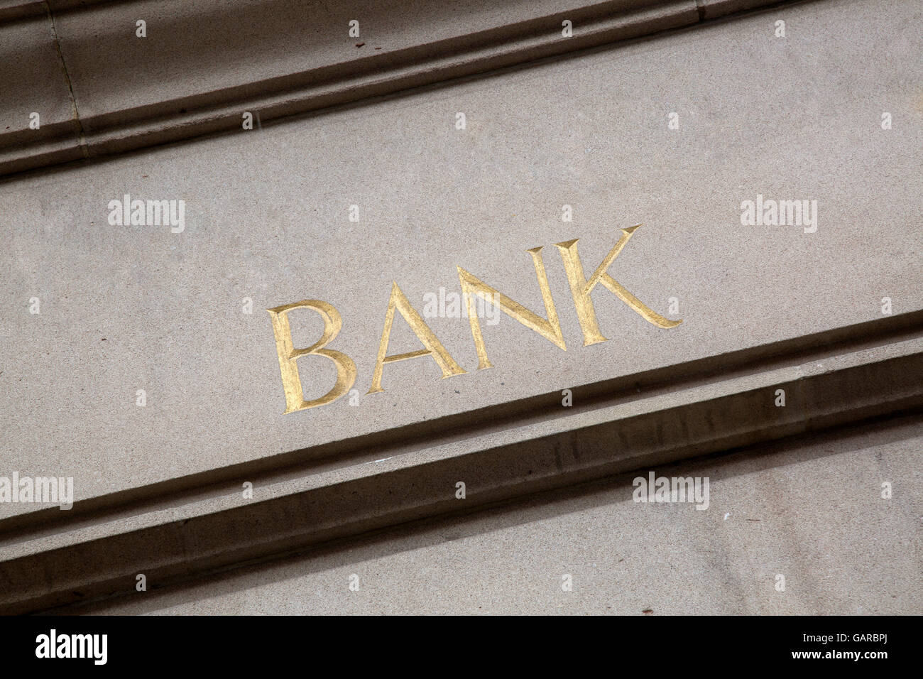 Bank Sign on Stone Facade Stock Photo - Alamy