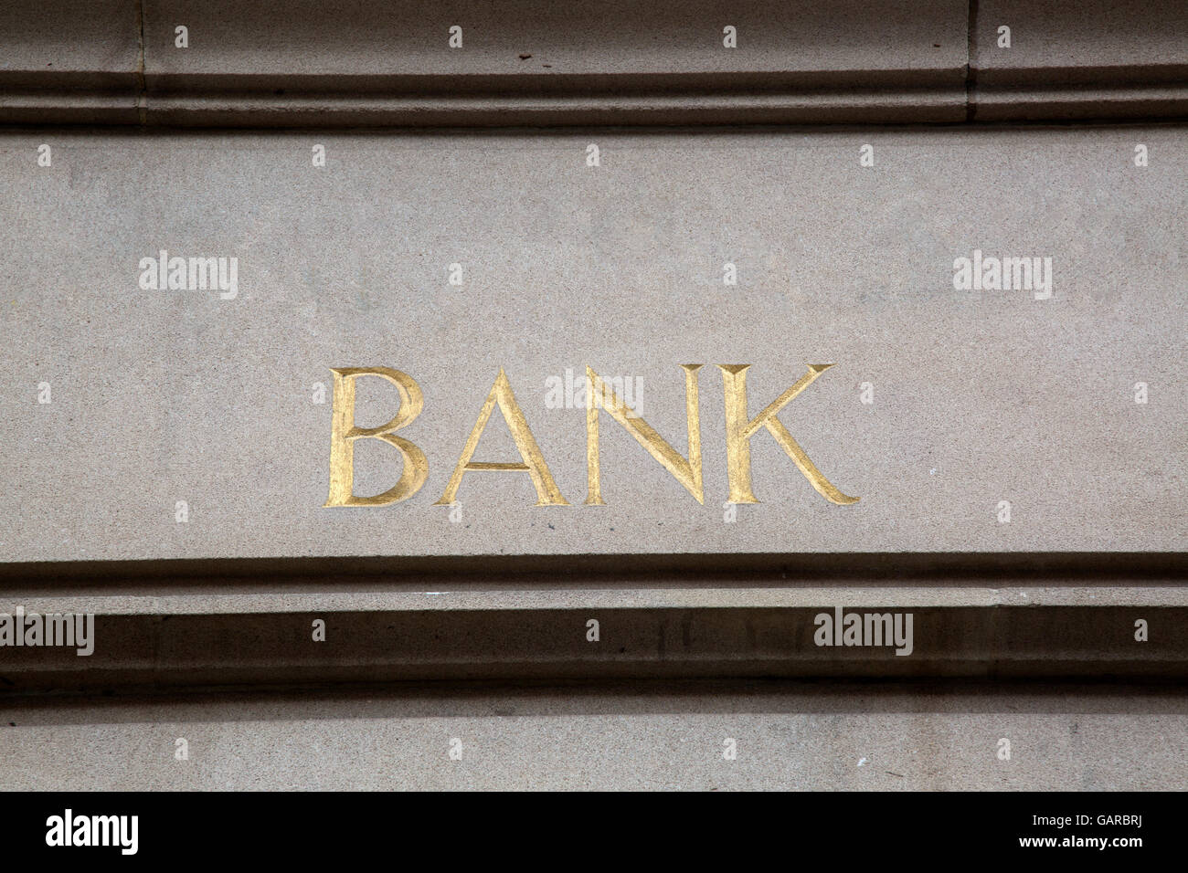 Bank Sign on Stone Facade Stock Photo - Alamy