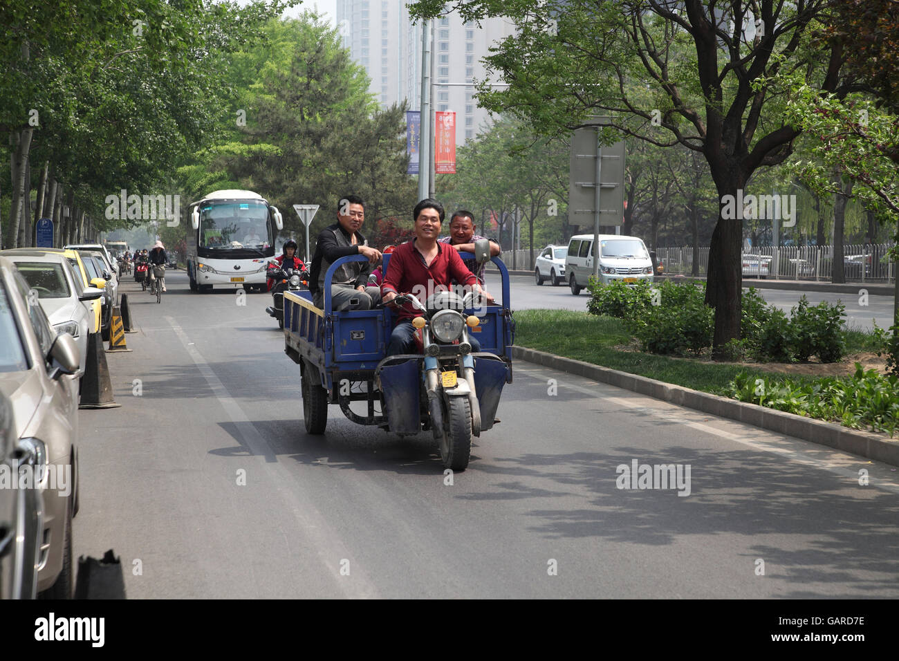 Three people riding a motorcycle hi-res stock photography and images ...