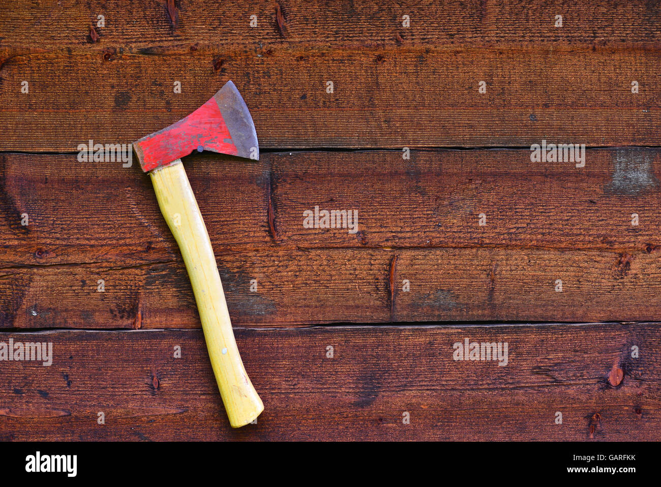 red axe on the wood wall Stock Photo - Alamy