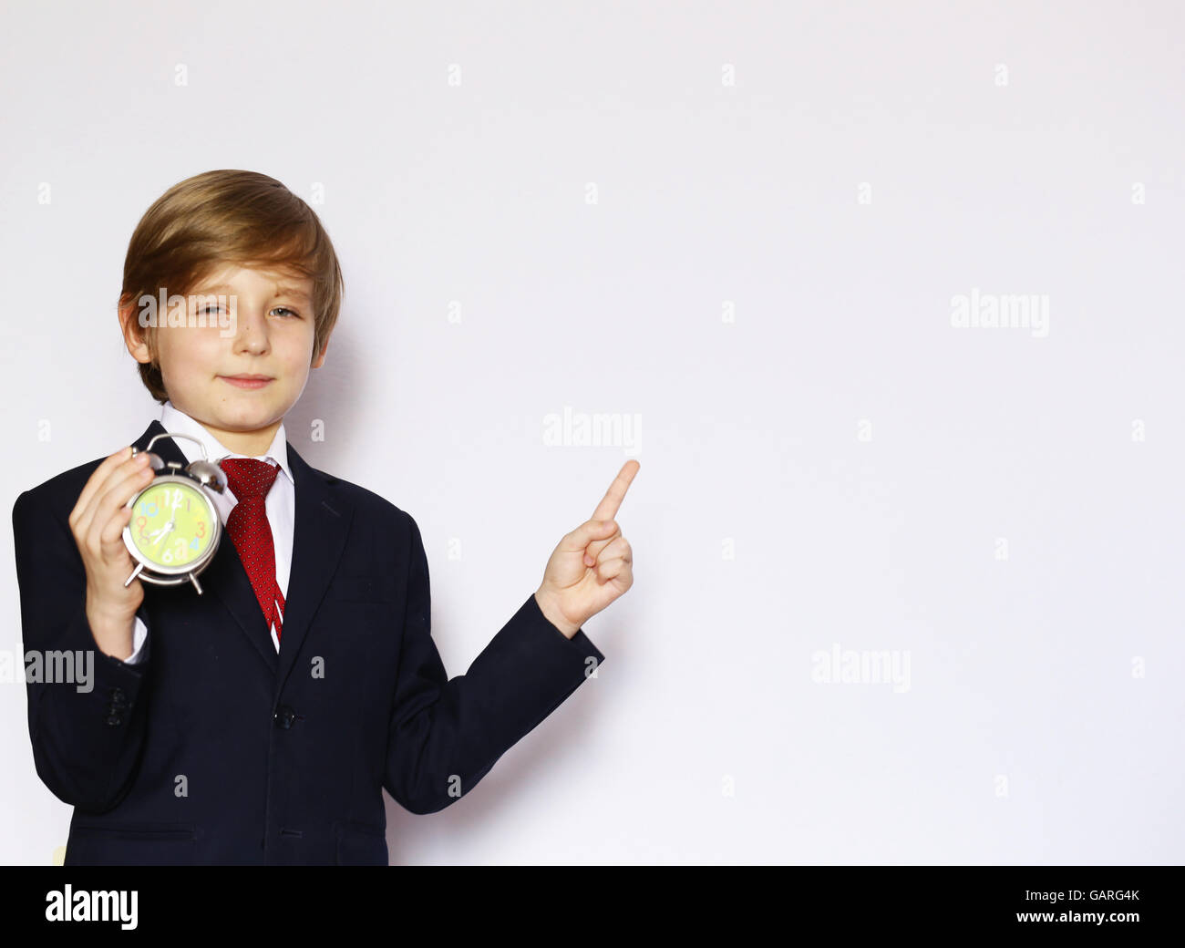 Boy showing clock hi-res stock photography and images - Alamy