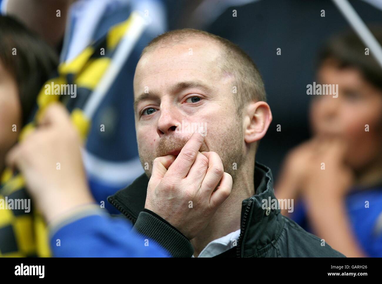 Cardiff city fan whistles during the national anthems hi-res stock ...