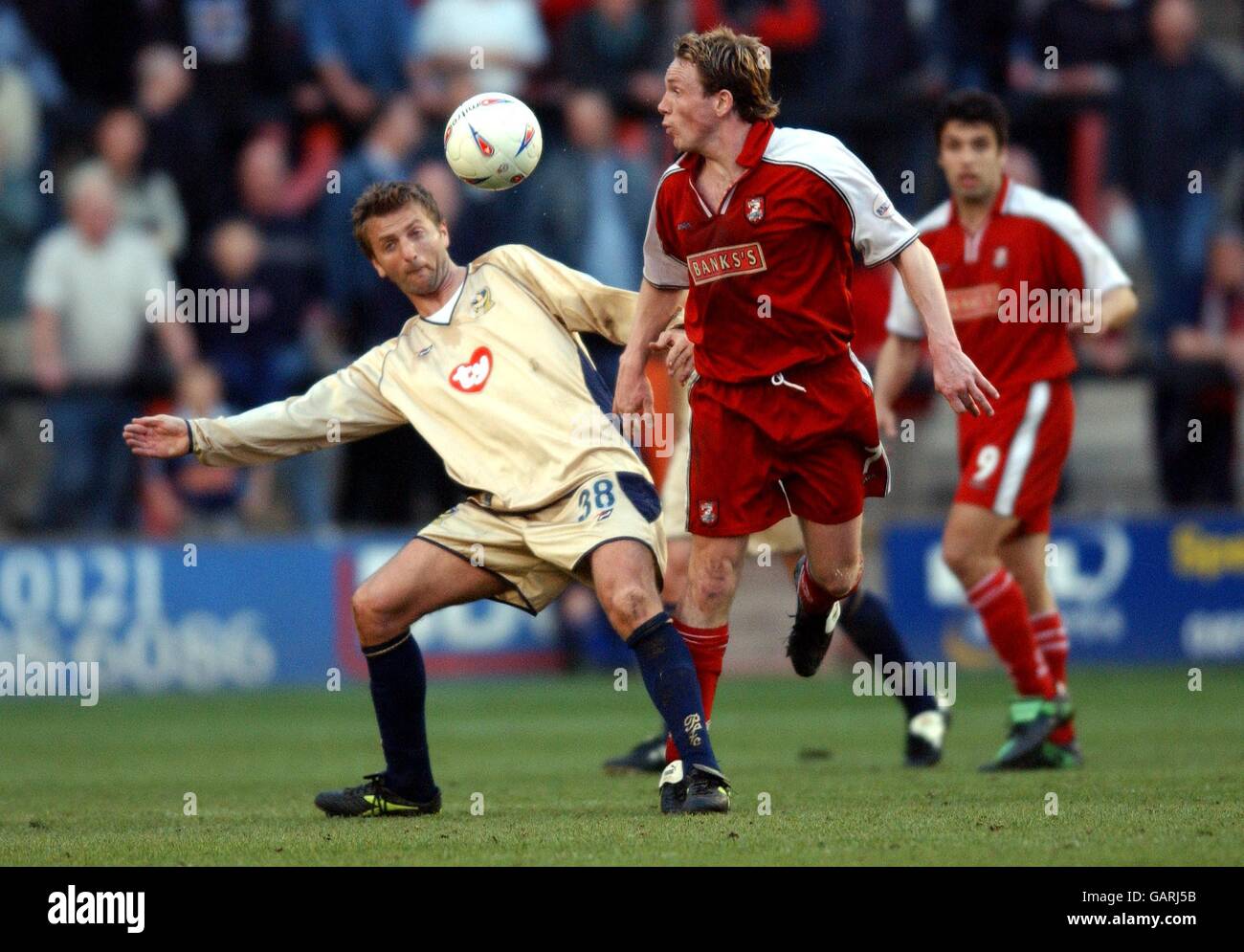 Walsall's Darren Wrack and Tim Sherwood of Portsmouth Stock Photo - Alamy