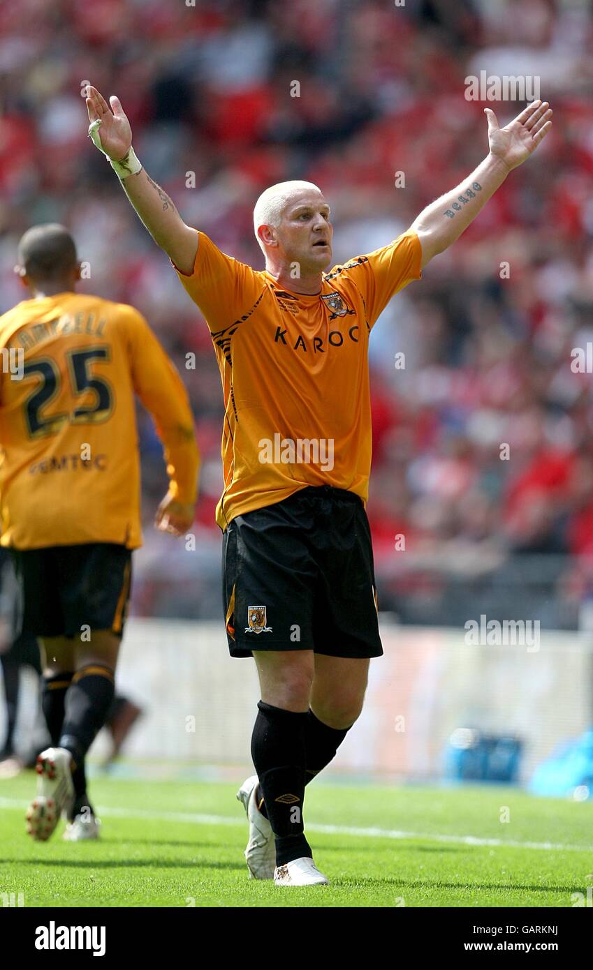 Hull City's Dean Windass (front) celebrates scoring the opening goal ...