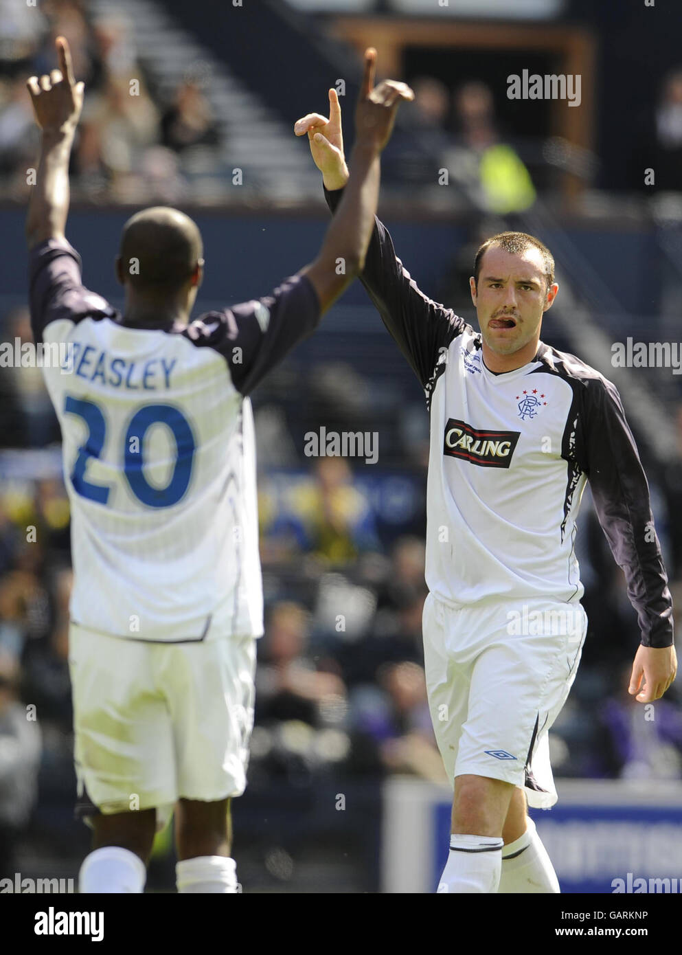 Rangers' players celebrate after Kris Boyd scores the opening goal ...