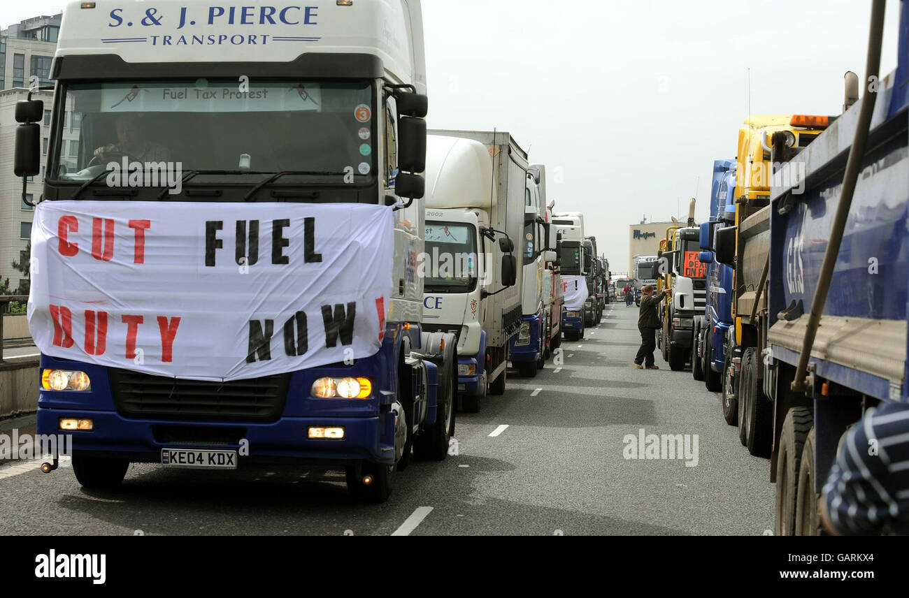 A line of lorries make their way along the elevated section of the A40 ...