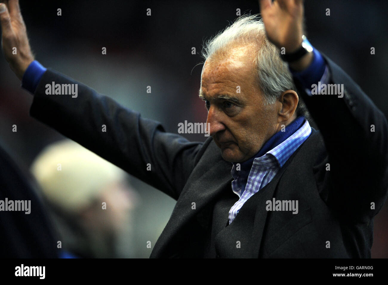 Former England and Stoke City player Alan Hudson on the pitch before ...