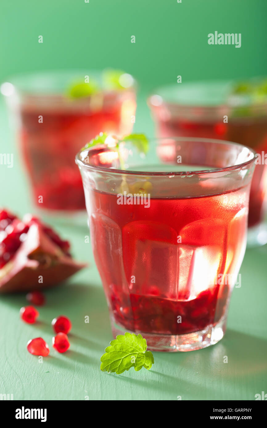 summer pomegranate drink with melissa Stock Photo - Alamy