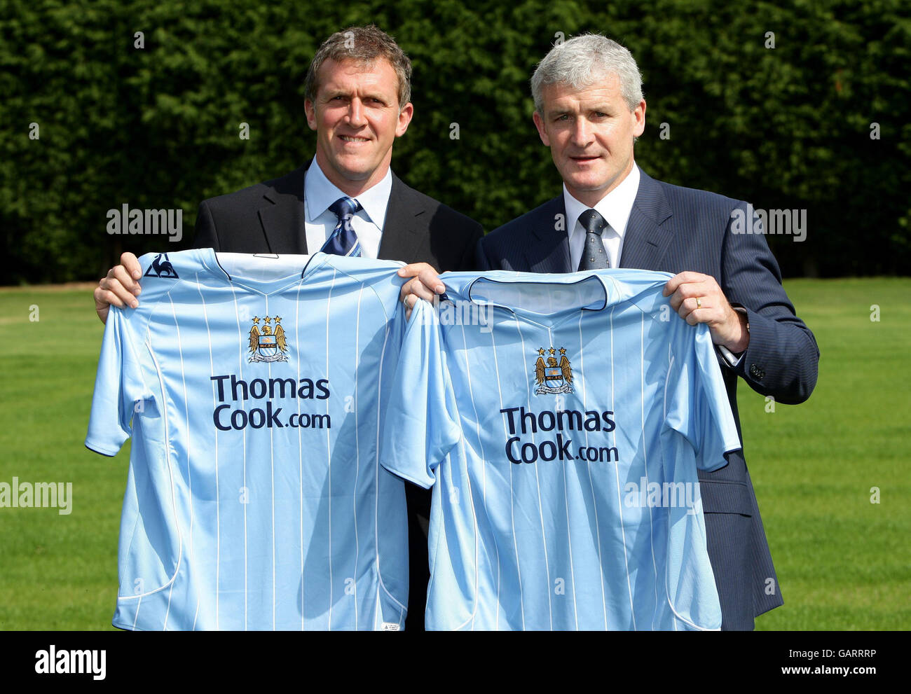 New Manchester City manager Mark Hughes with Chief Executive Garry Cook ...