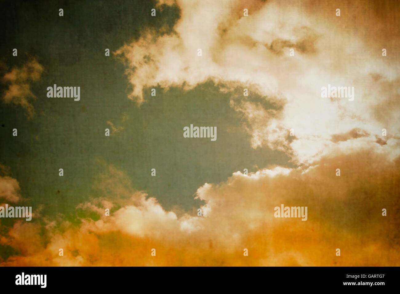 Vintage grunge clouds background with light leak Stock Photo - Alamy