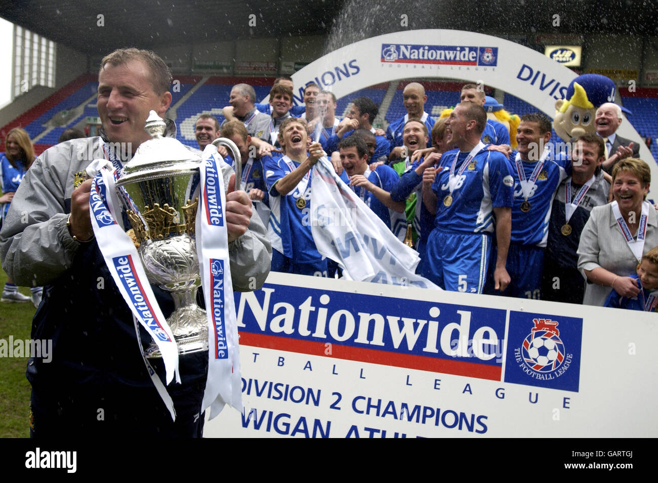 Wigan Athletic's manager Paul Jewell with the second division trophy as ...