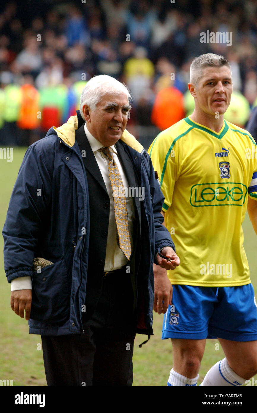 l-r; Cardiff City's chairman Sam Hammam walks off at the end of the ...