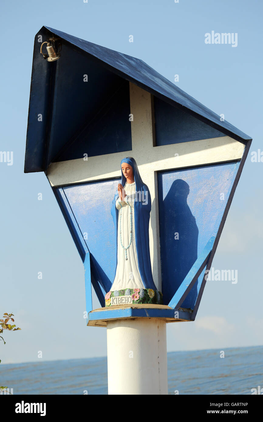 Statue of Mother Mary in front of the catholic church of the shrine of ...