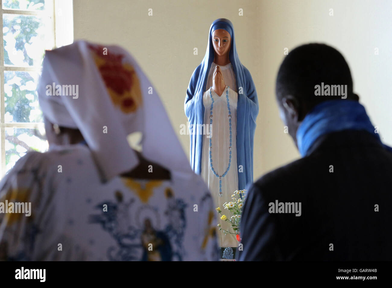 Statue of Mother Mary in the chapel of the catholic church of the ...