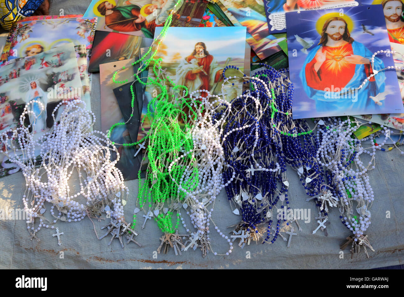 Rosaries of a devotional trader at the pilgrimage site KIBEHO in Rwanda ...