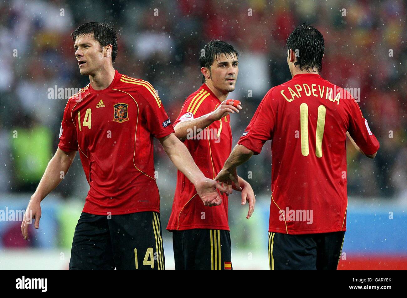 David villa and joan capdevila celebrate after the final whistle hi-res ...