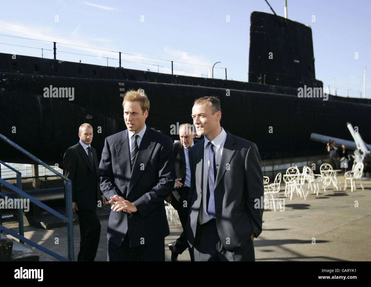 Prince William walks after he toured HMS Alliance, a WWII submarine ...
