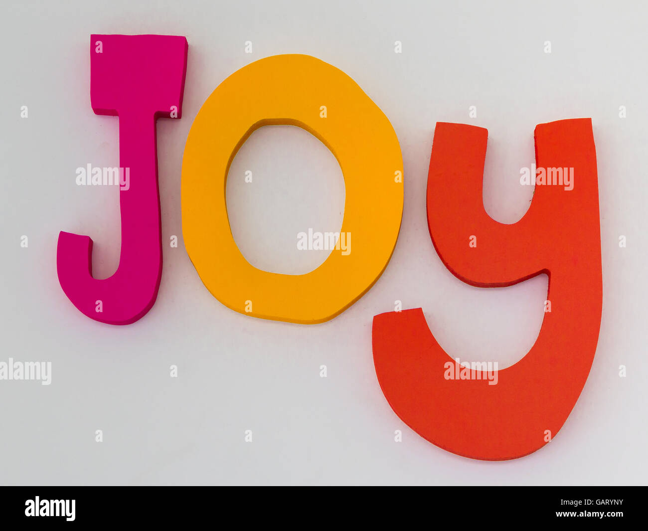 Colorful Words Joy: Text Message on White Background Stock Photo - Alamy