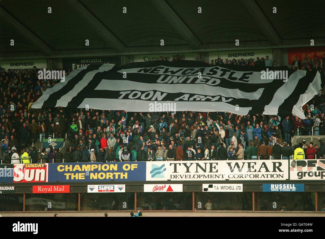 SOCCER. NEWCASTLE UNITED FANS WITH GIANT FLAG Stock Photo - Alamy