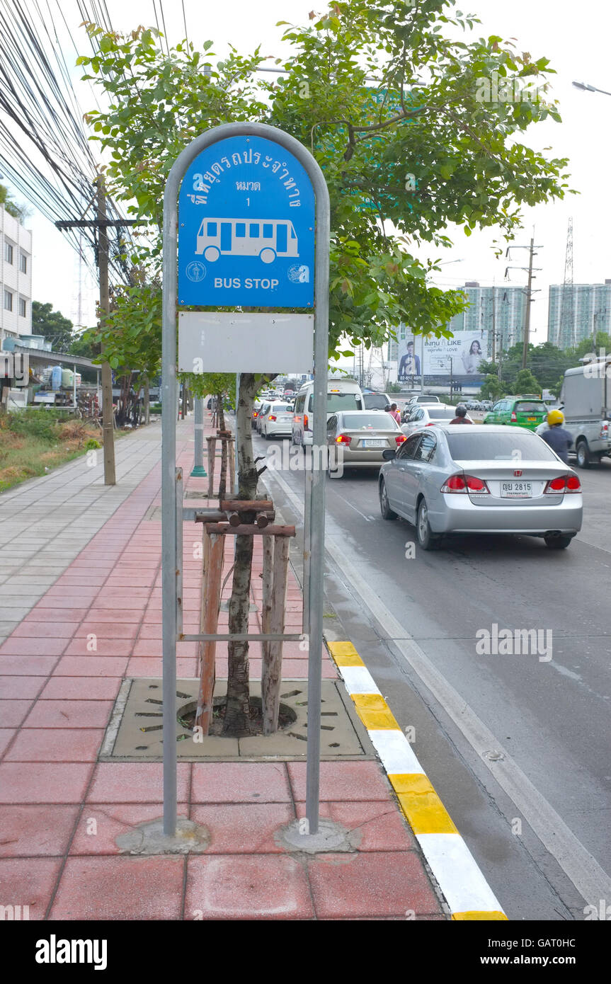 Traffic sign of bus stop on road pavement Stock Photo - Alamy