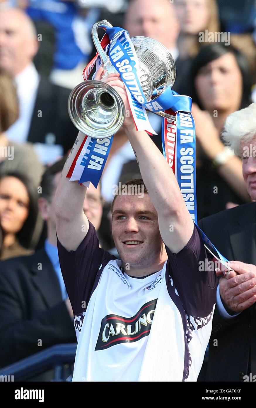 Rangers' John Fleck celebrates with the trophy after winning the ...