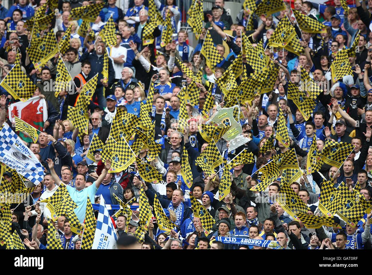 Cardiff city fans cheer on side in stands hi-res stock photography and ...