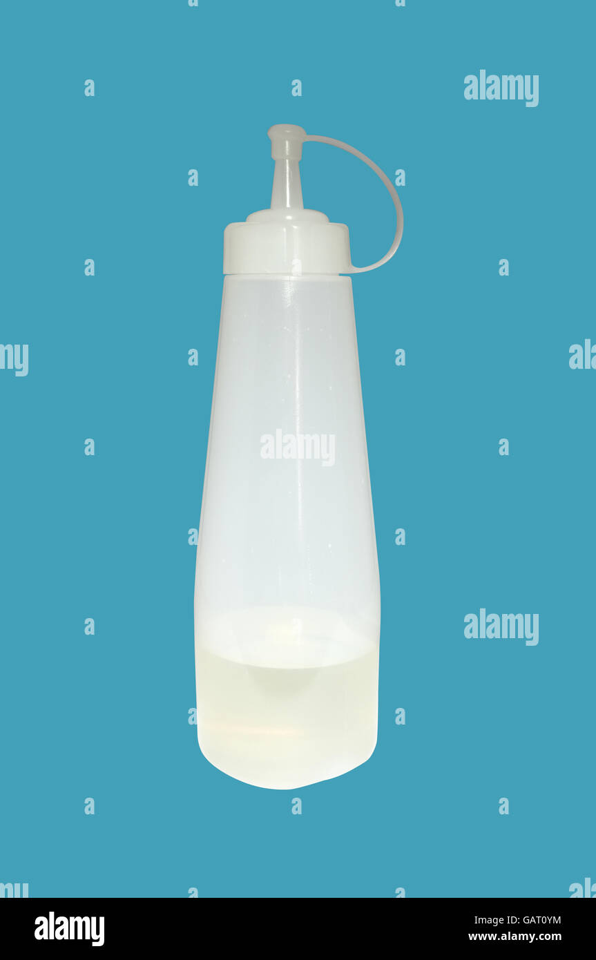 White sauce bottle isolated Stock Photo - Alamy