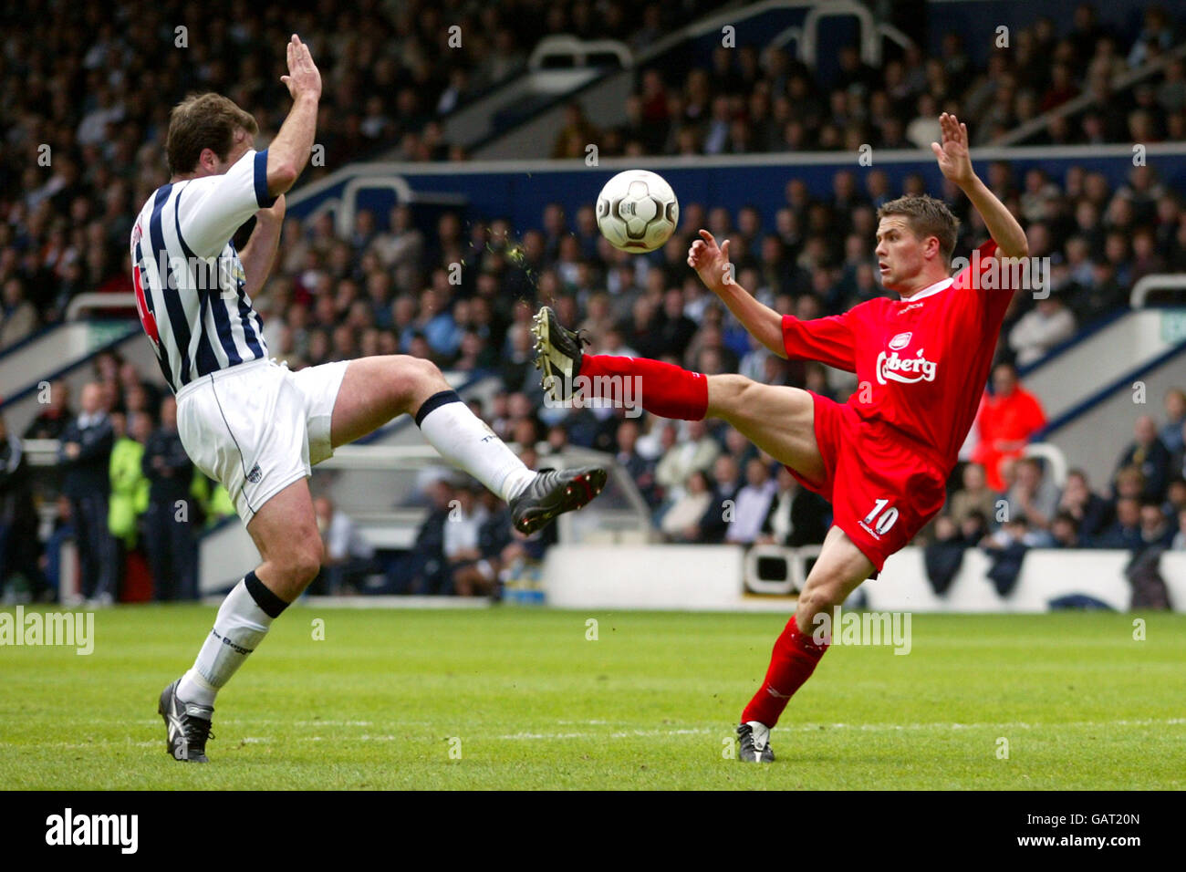 West Bromwich Albion's Sean Gregan and Liverpool's Michael Owen battle ...