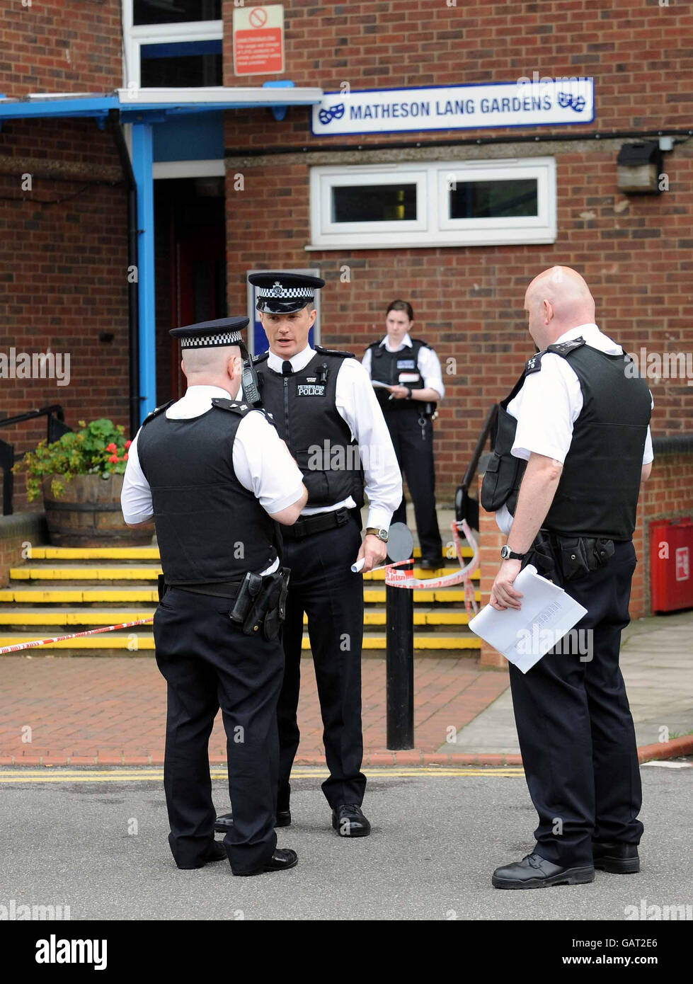 Police officers at Matheson Lang Gardens, a block of flats in Lambeth ...