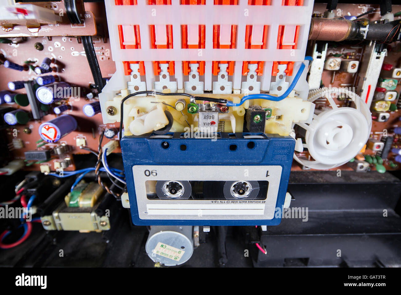 old tape cassette inside a broken hifi system Stock Photo - Alamy