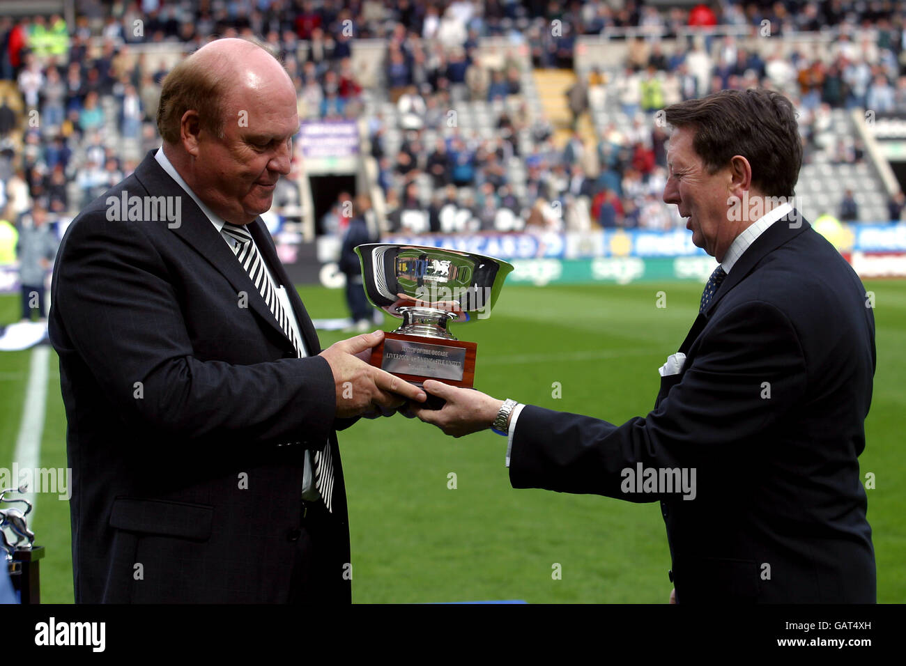 Newcastle United's Chairman Freddy Shepherd (l) receives the ...