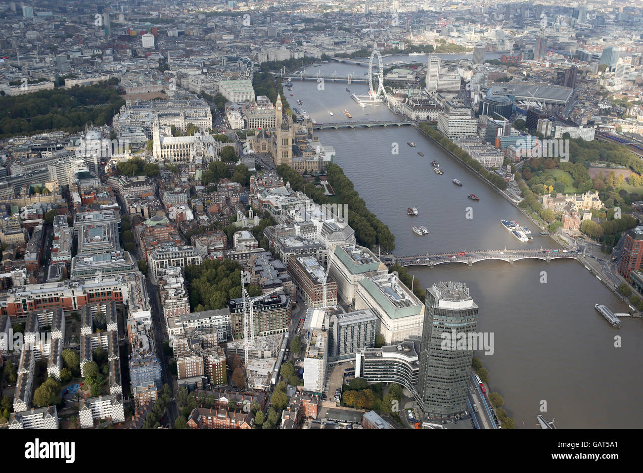 a view of london city skylinewith houses of parliment and london eye ...