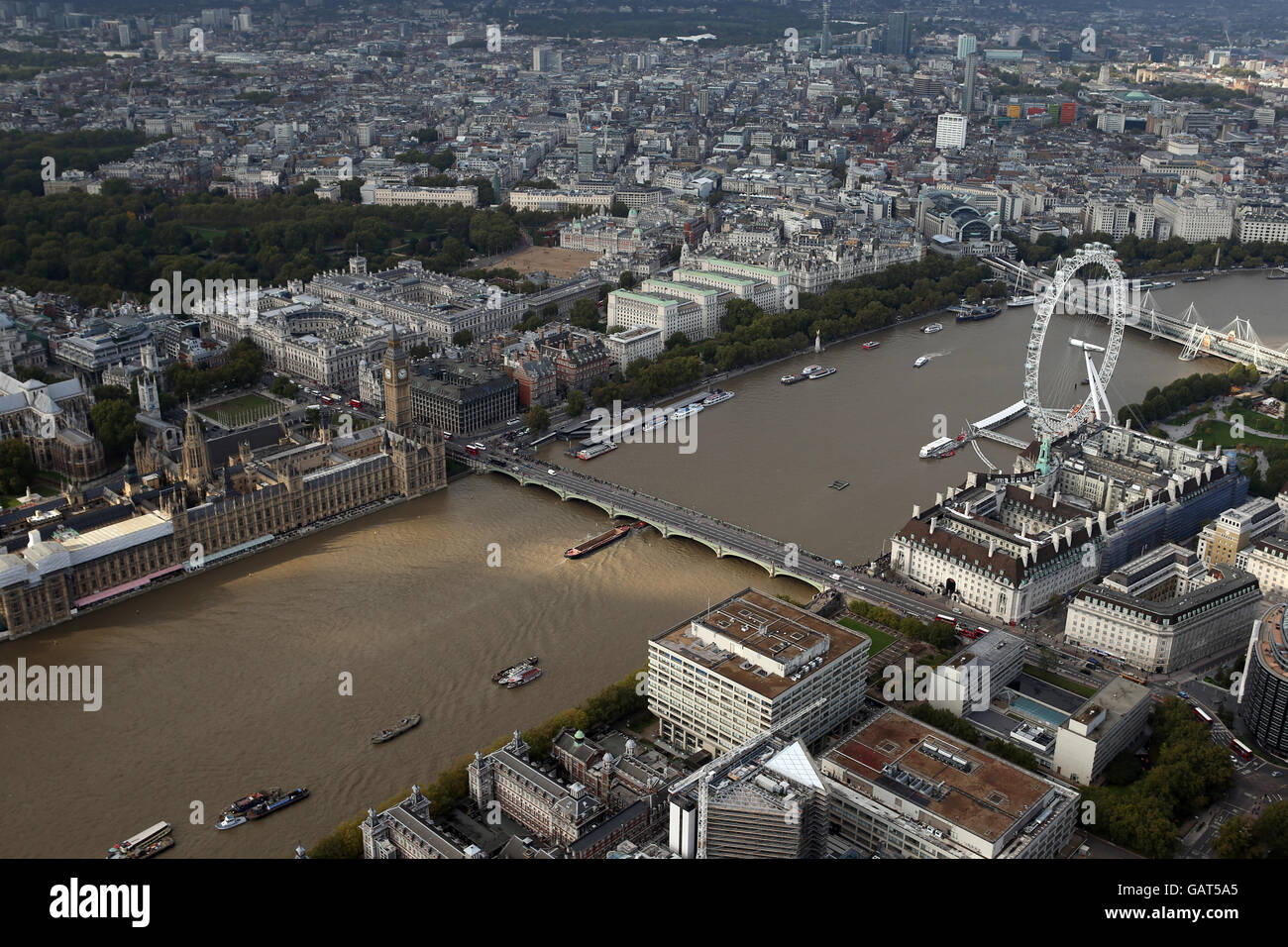 a view of london city skylinewith houses of parliment and london eye ...