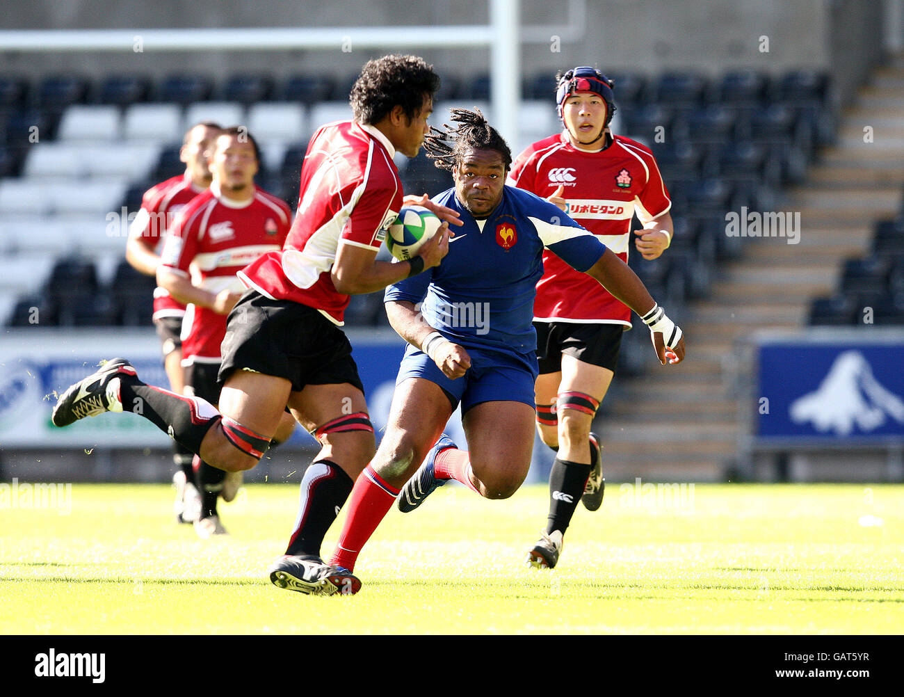 France's Mathieu Bastareaud closes in on Japan's Pohiva Lotoahea for ...