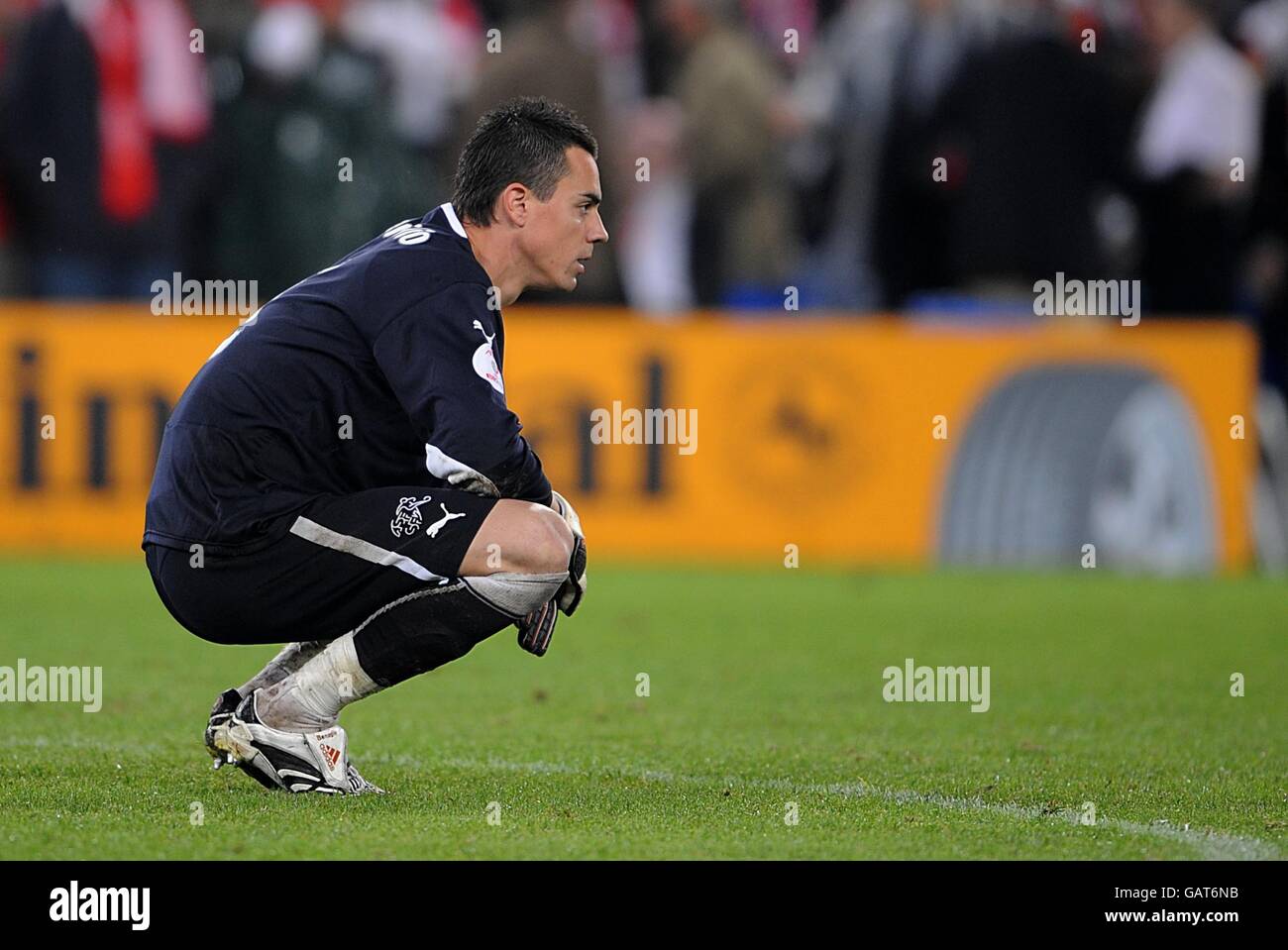 Switzerland's Diego Benaglio looks dejected after the final whistle ...