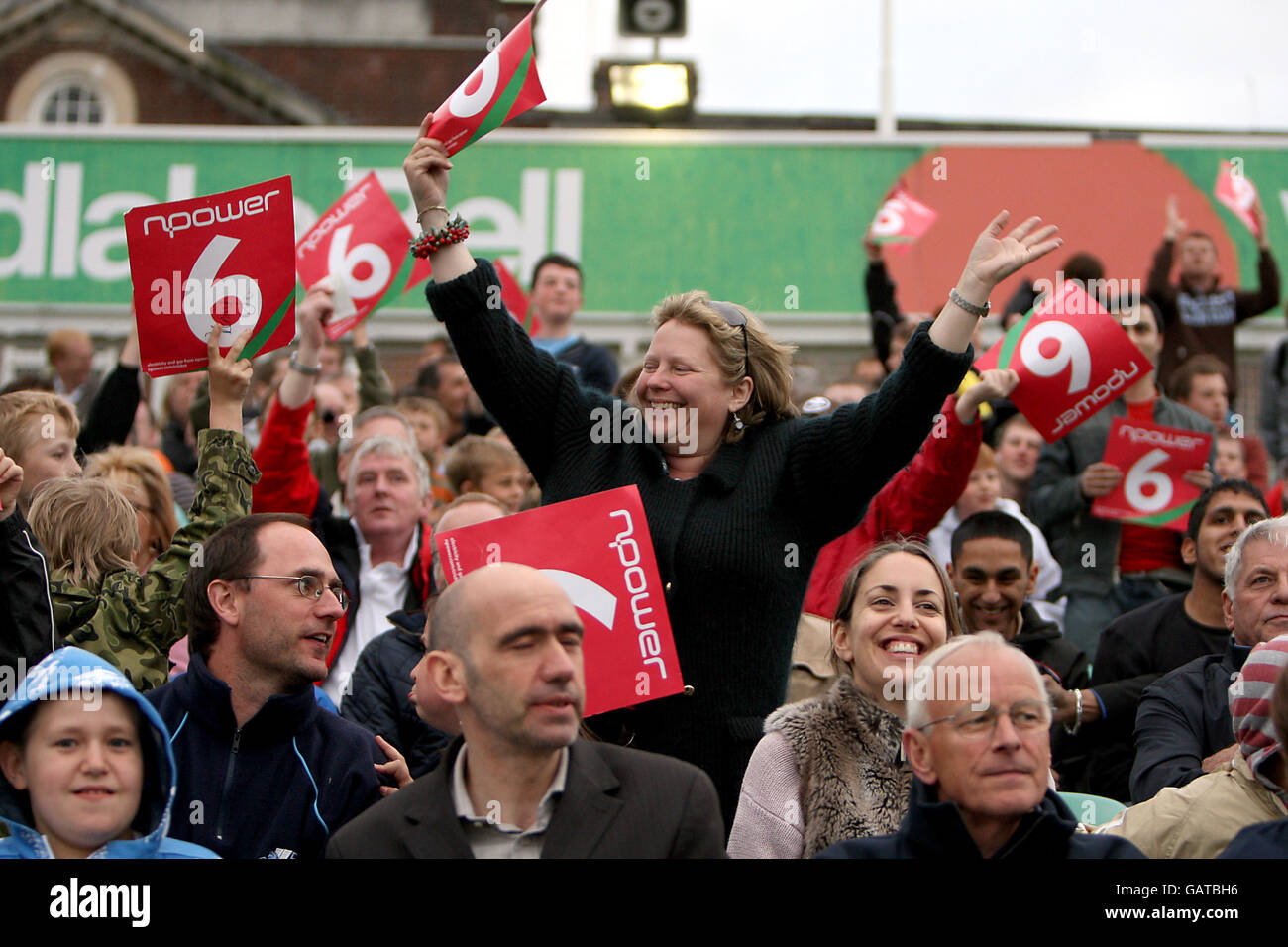 Fans in the Wedlake Bell Family enclosure at the Brit Oval enjoy the ...