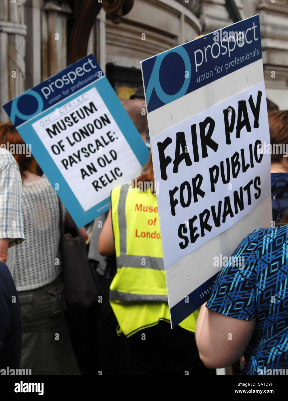 Union members display placards outside the Methodist Central Hall in ...
