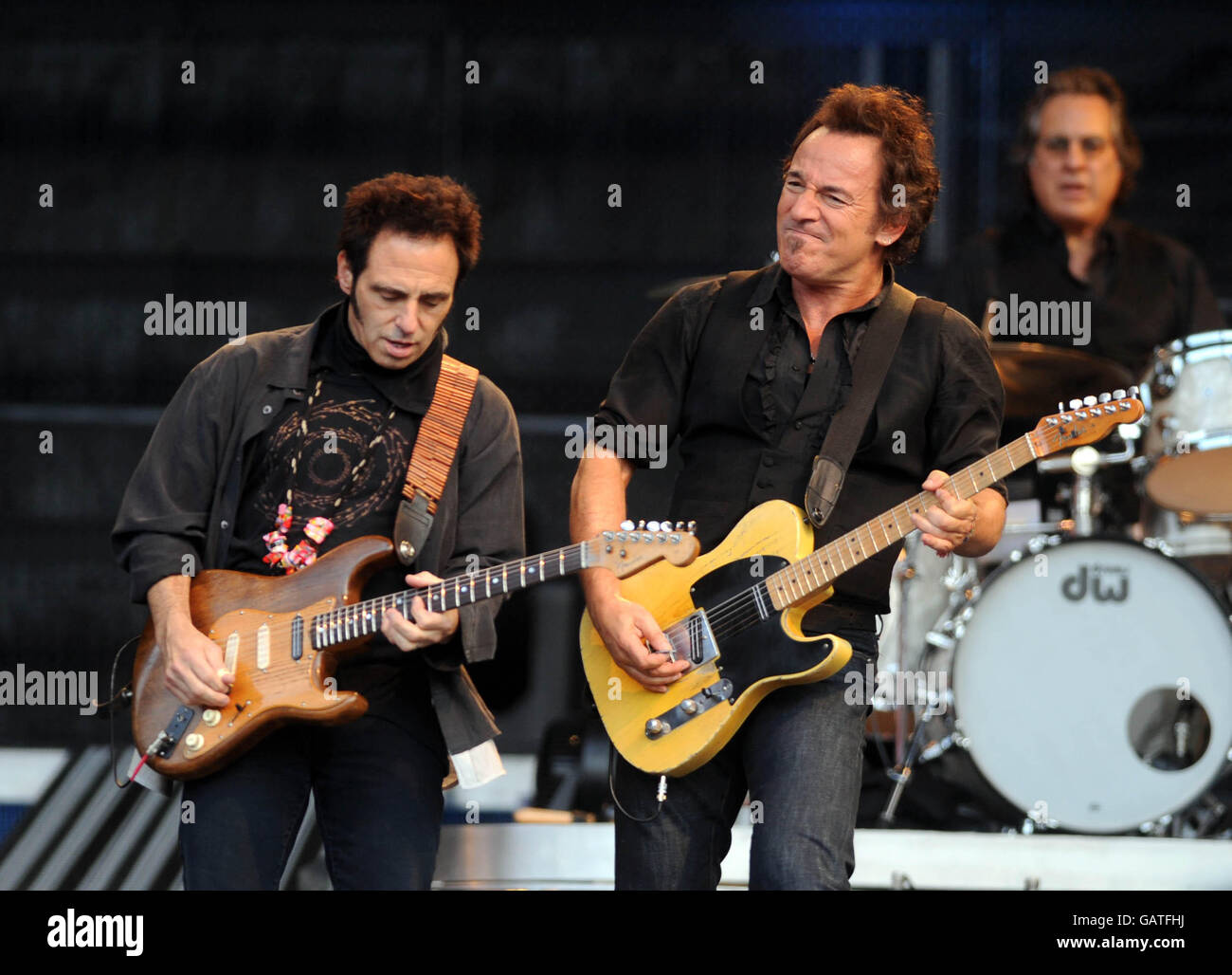 Bruce Springsteen in concert - London. Bruce Springsteen (centre ...