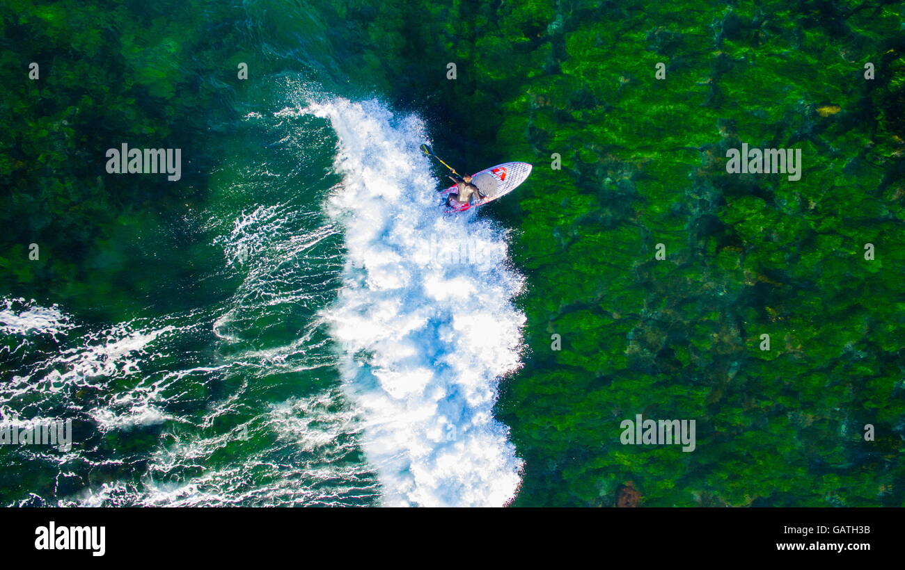 Aerial view surfing on waves hi-res stock photography and images - Alamy