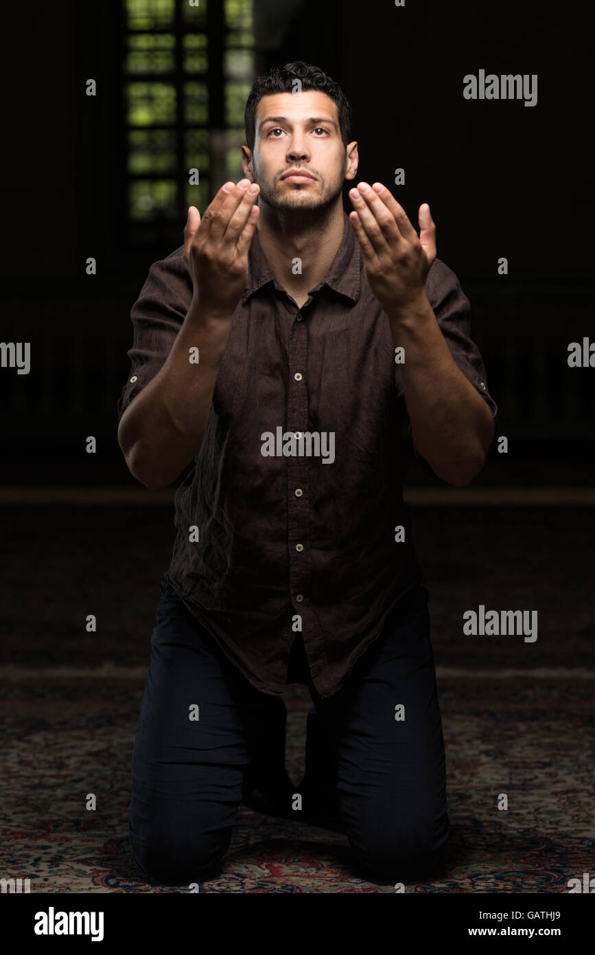 Humble Muslim Man Is Praying In The Mosque Stock Photo - Alamy