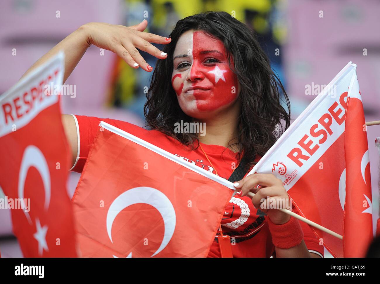 A Turkish fan shows her colours and support in the stands before the ...