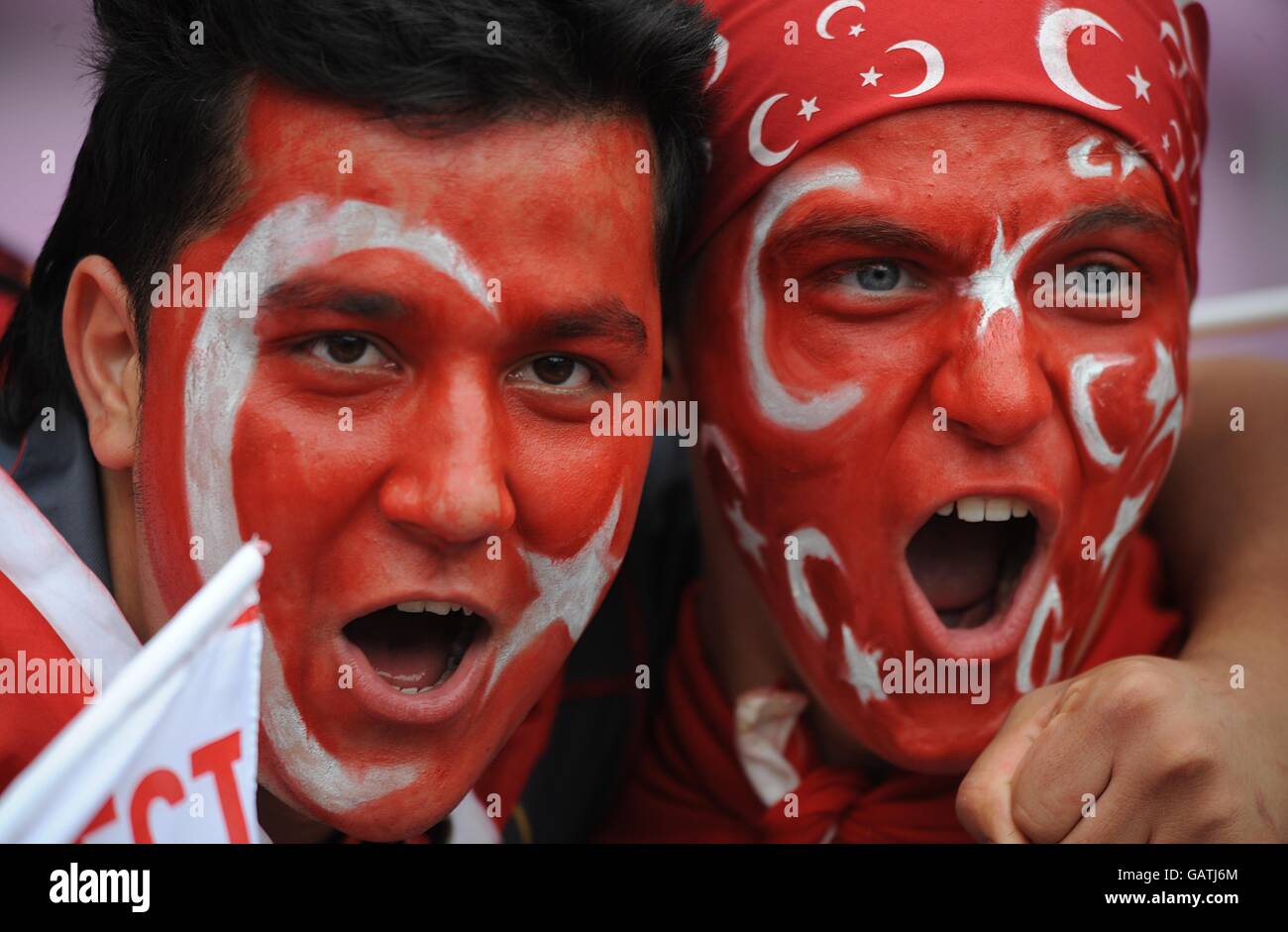 Two Turkish fans shows their colours and support outside of the stadium ...